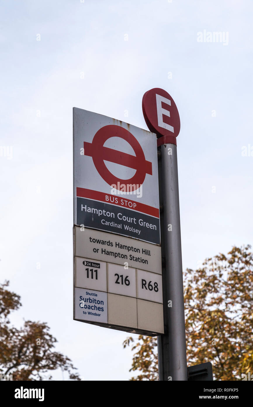Bus stop sign at Hampton Court Green,London,England,UK Stock Photo - Alamy