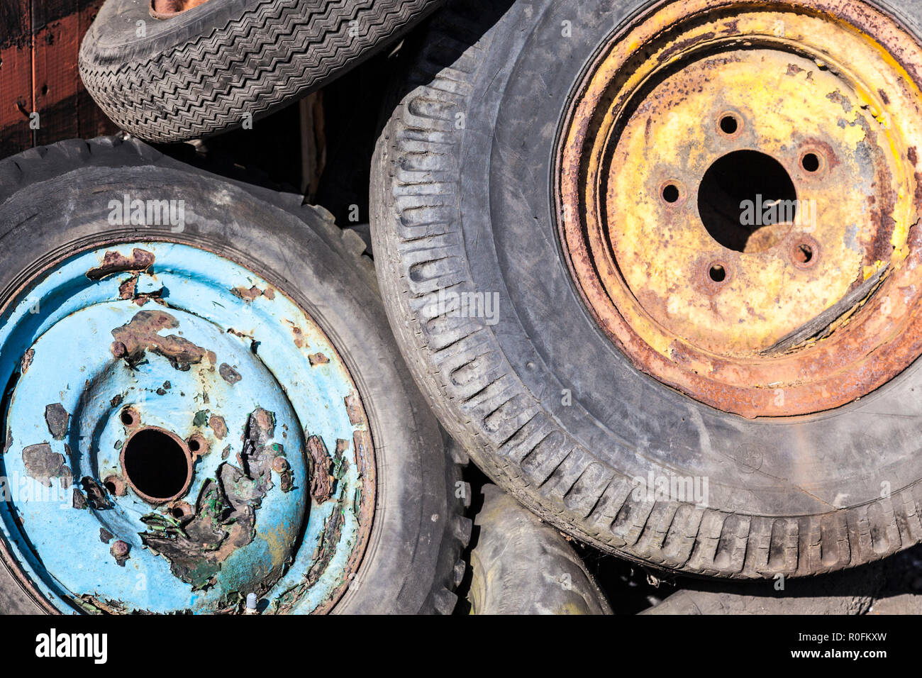 Old truck car wheel discarded left to rust rusty wheel hi-res stock ...