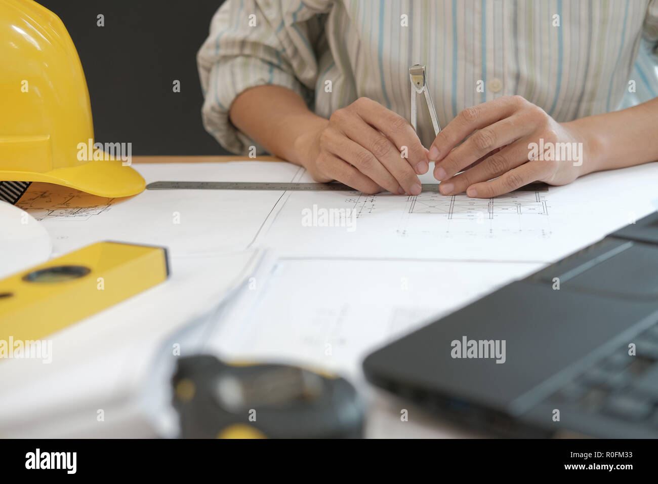 architect engineer working on house blueprint of real estate project at ...