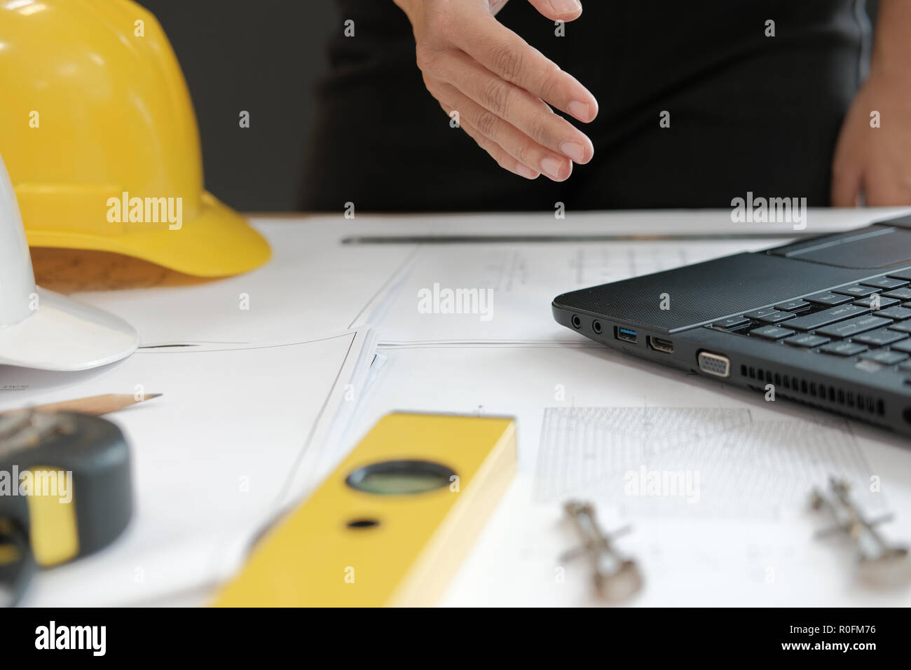 engineer offering handshake. architect ready to shake hand for building ...