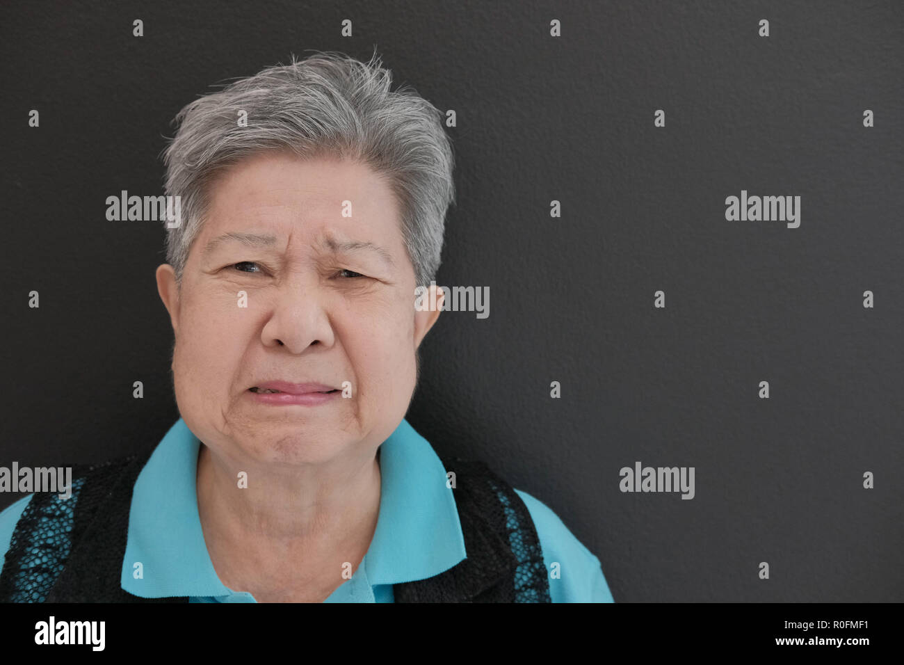furious elder woman, enraged elderly female. angry asian senior Stock ...