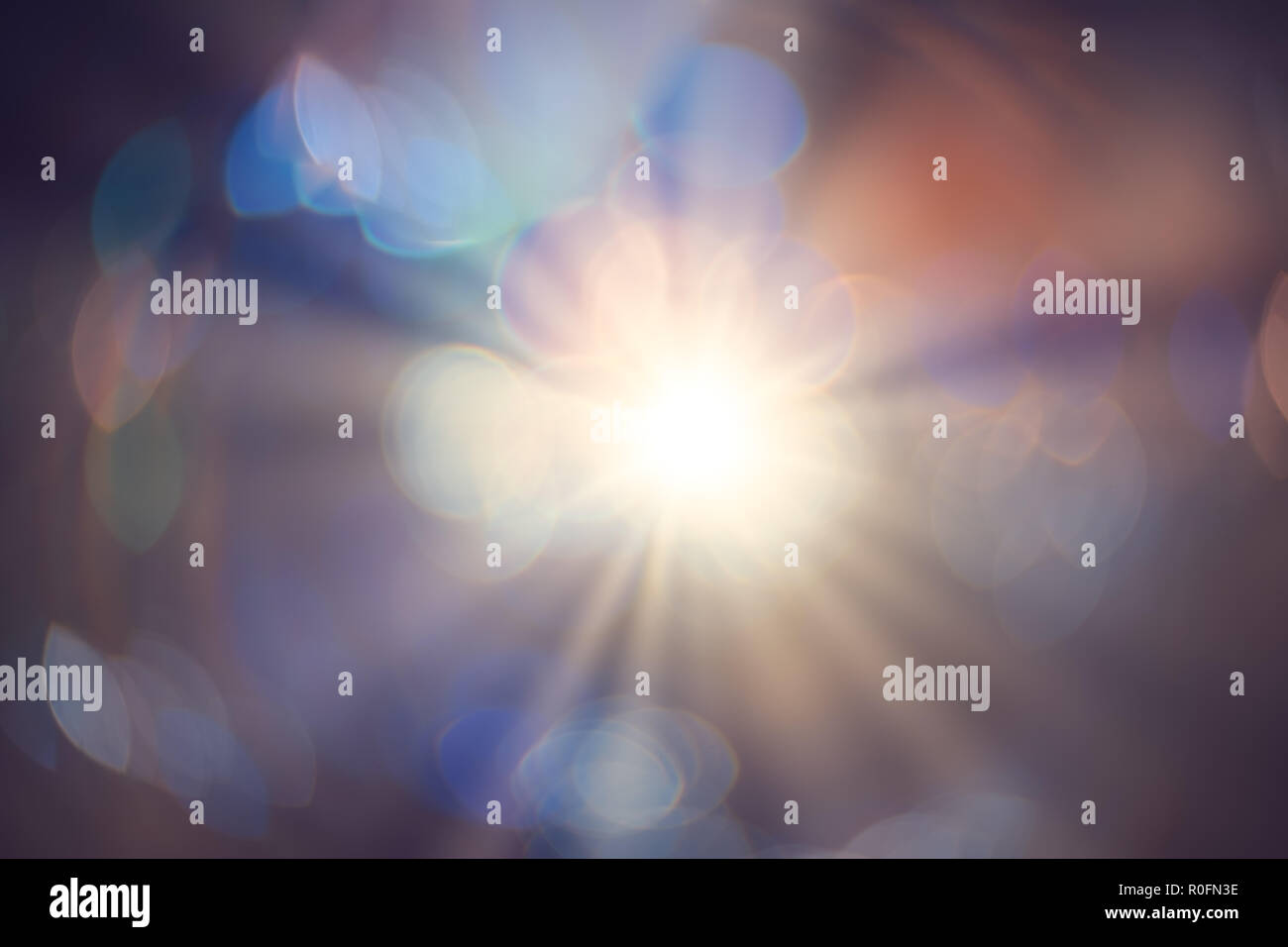 Bokeh colorful light flare in the center of abstract blur background ...