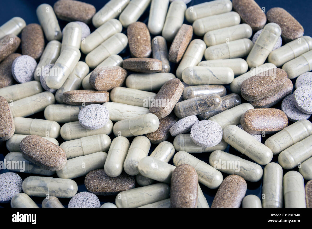 some pills of different size and shape Stock Photo - Alamy