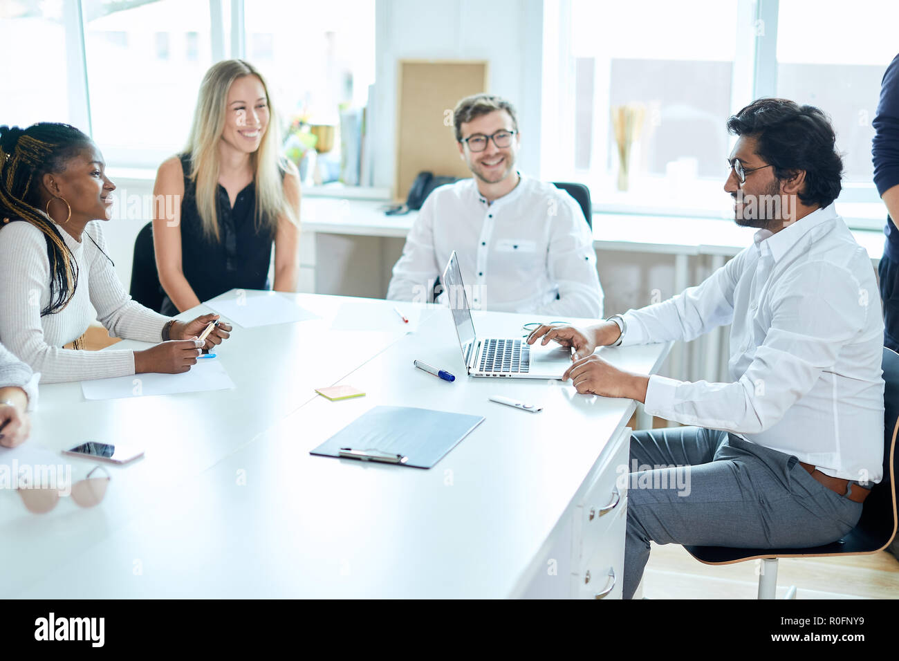 positive ambitious office workers having fun at workplace Stock Photo ...