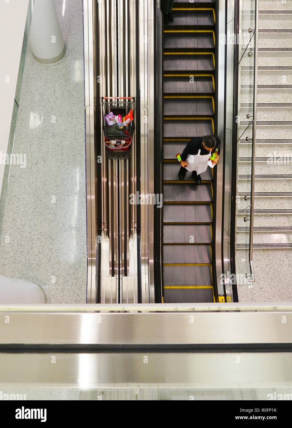 CHICAGO, IL -31 OCT 2018- View of a shopping cart conveyor escalator ...