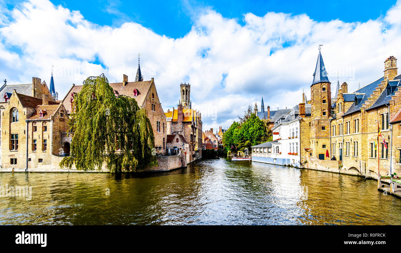 View of the historic buildings and the Belfort Tower from the Dijver ...