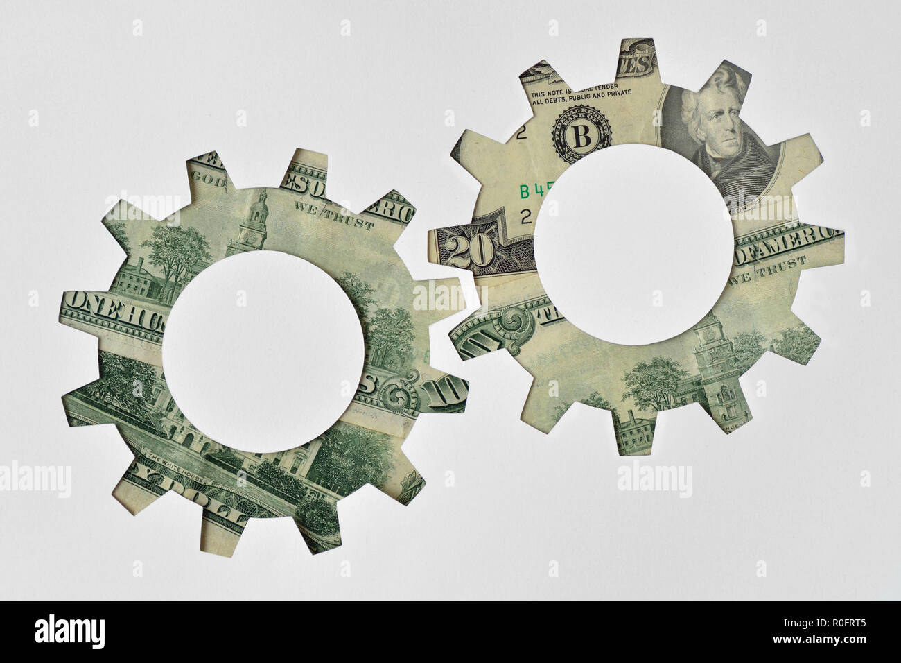 Gear made of dollar banknotes - Financial system concept Stock Photo ...