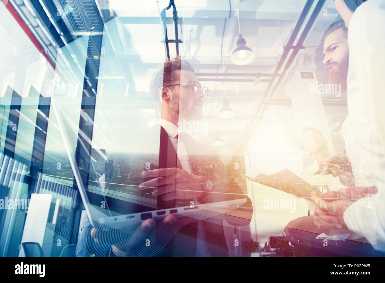 Business people work together in office with a laptop. Concept of ...