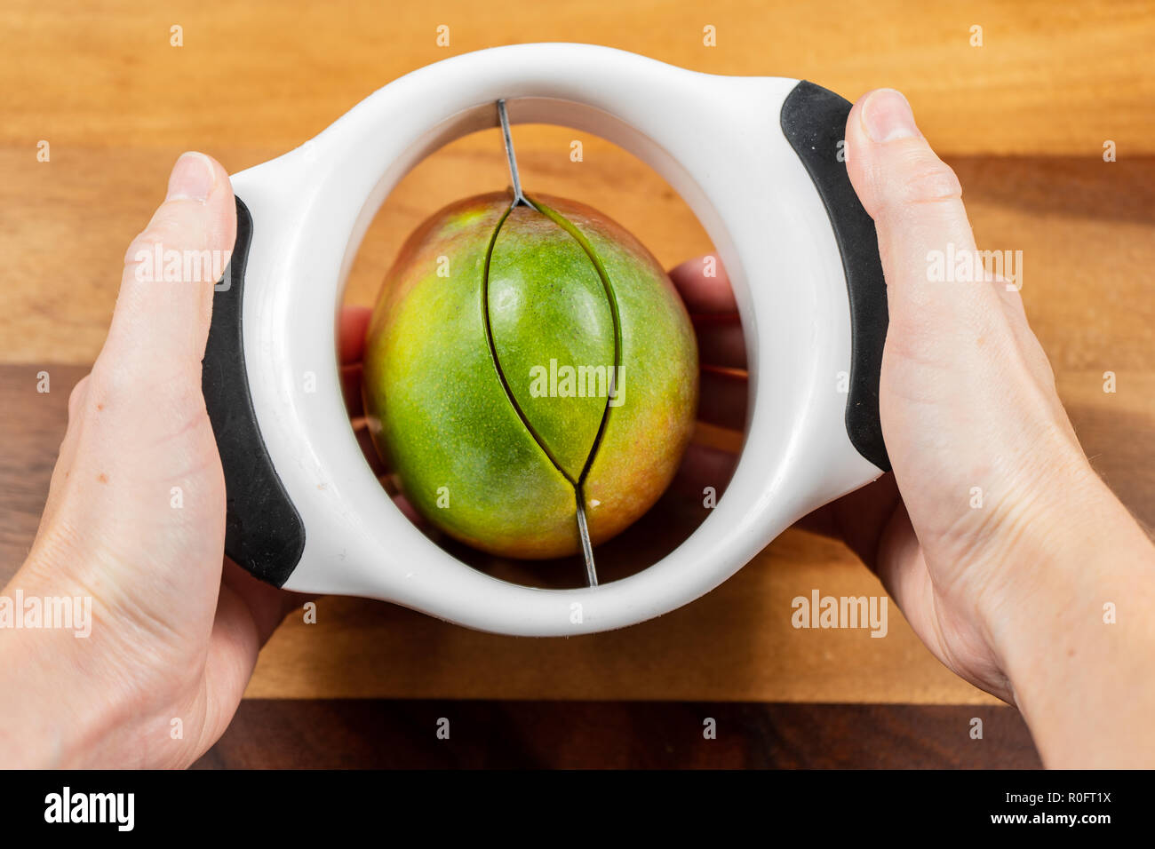 The Mango Splitter slices cleanly through the fruit and leaves almost ...