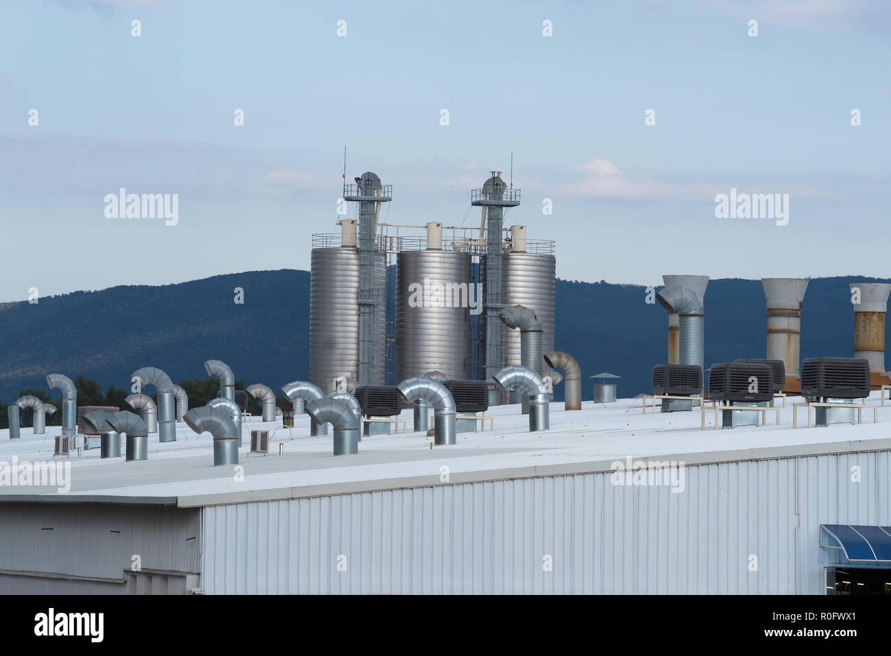 Clean production. A modern factory building Stock Photo - Alamy