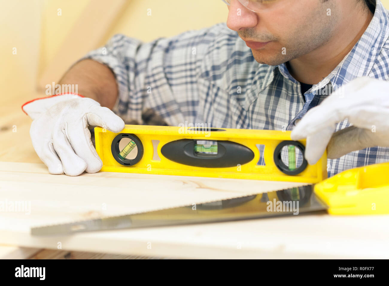 Portrait of a carpenter doing a precision work in an house Stock Photo ...