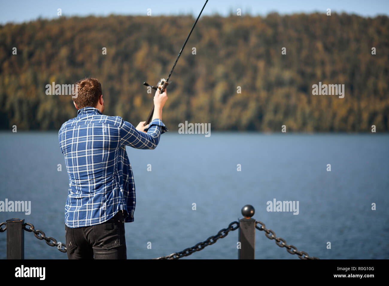 Man trying to catch fish hi-res stock photography and images - Alamy