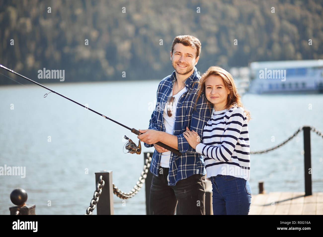 Romantic couple fishing hi-res stock photography and images - Alamy