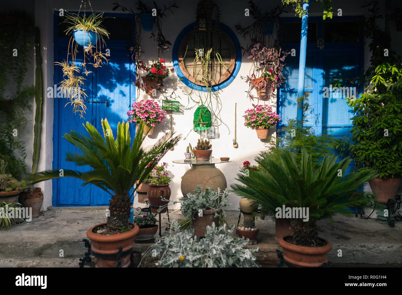 Typical andalusian courtyard in Cordoba, Andalusia Spain with blue ...