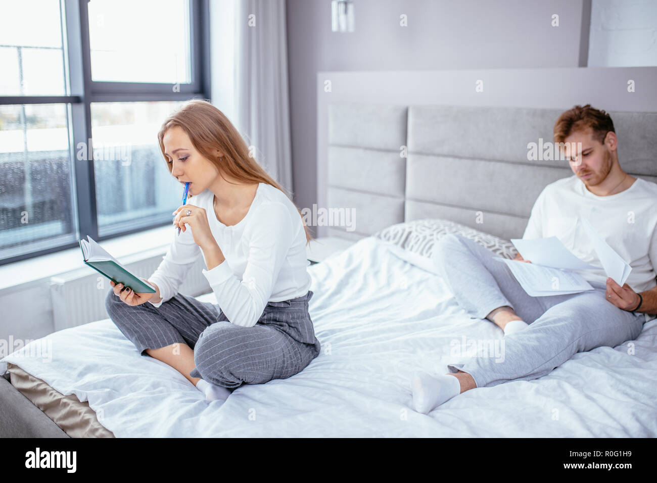 Man notebook pen bed hi-res stock photography and images - Alamy