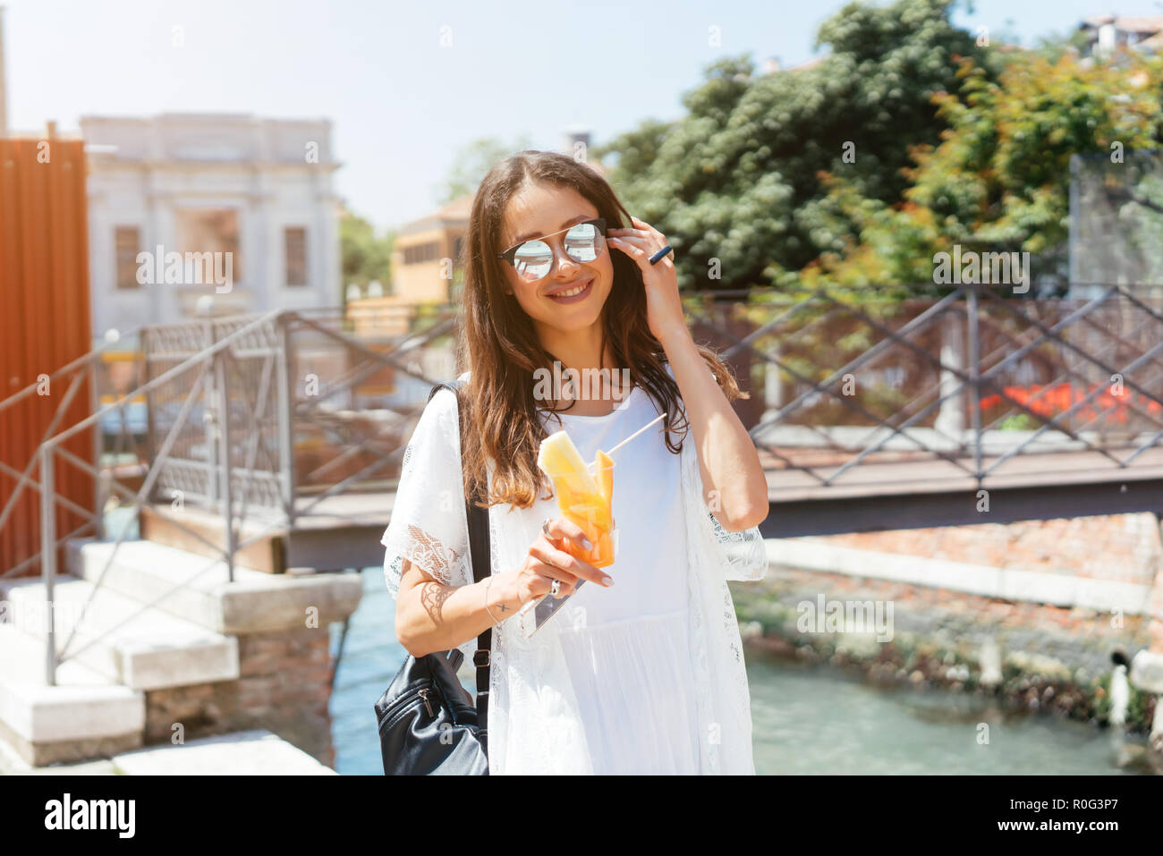 Beautiful young woman eating healthy food on travel vacation Stock ...