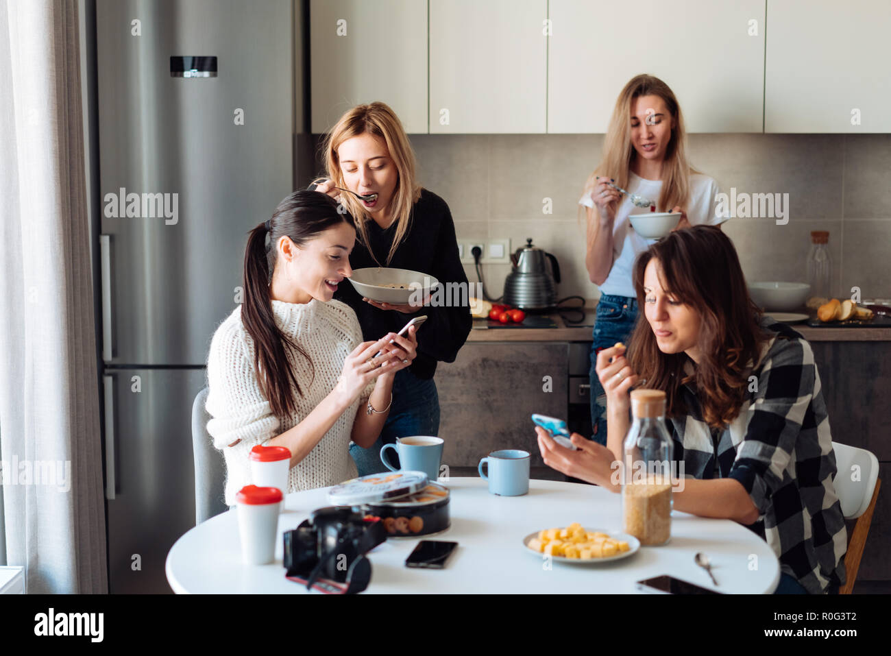 group of women in the kitchen Stock Photo - Alamy