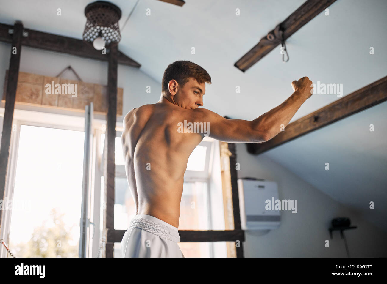 Standing in winner posture hi-res stock photography and images - Alamy