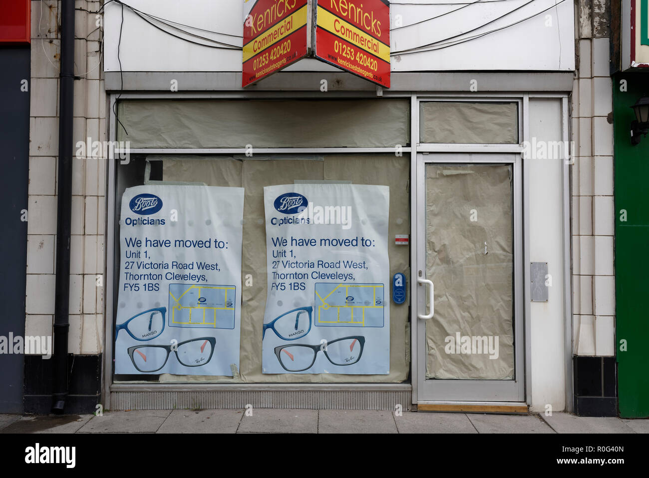 Empty shop on high street, Boots opticians, we have moved location ...