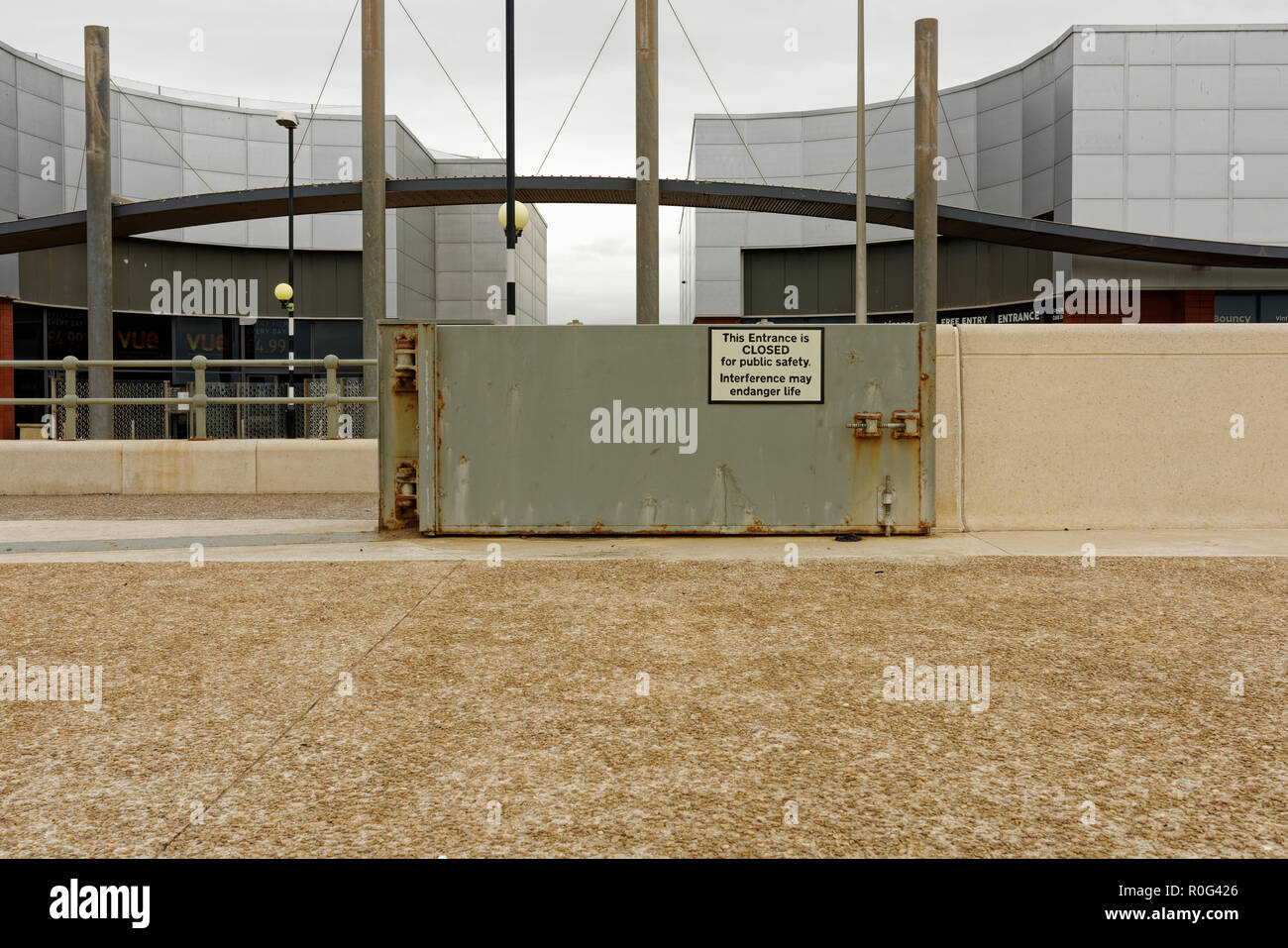 Steel flood gate on cleveleys promenade attached to concrete sea wall ...