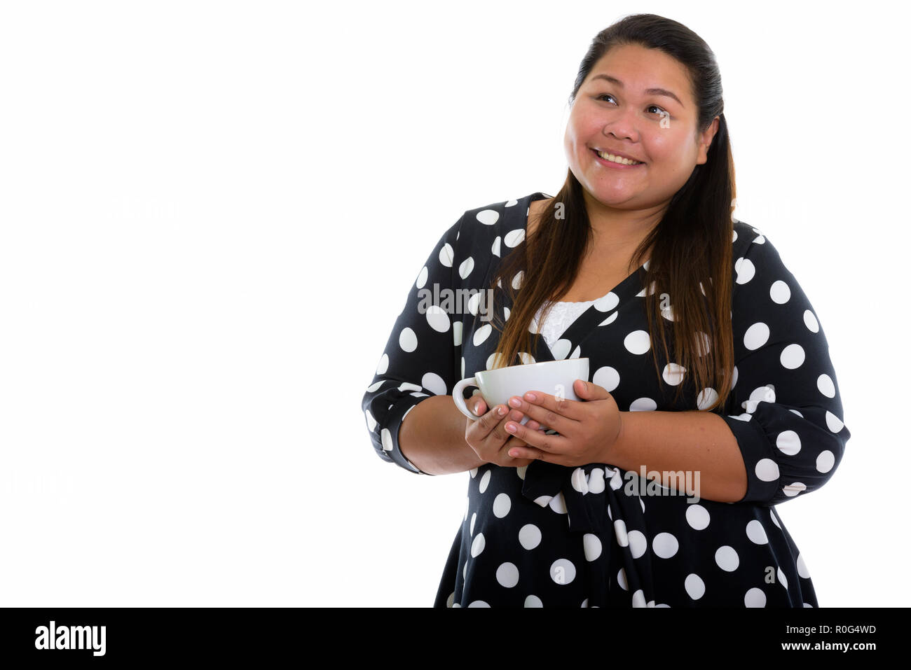 Happy overweight asian woman thinking hi-res stock photography and ...