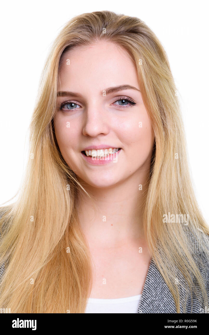 Face of young happy blonde businesswoman smiling Stock Photo - Alamy