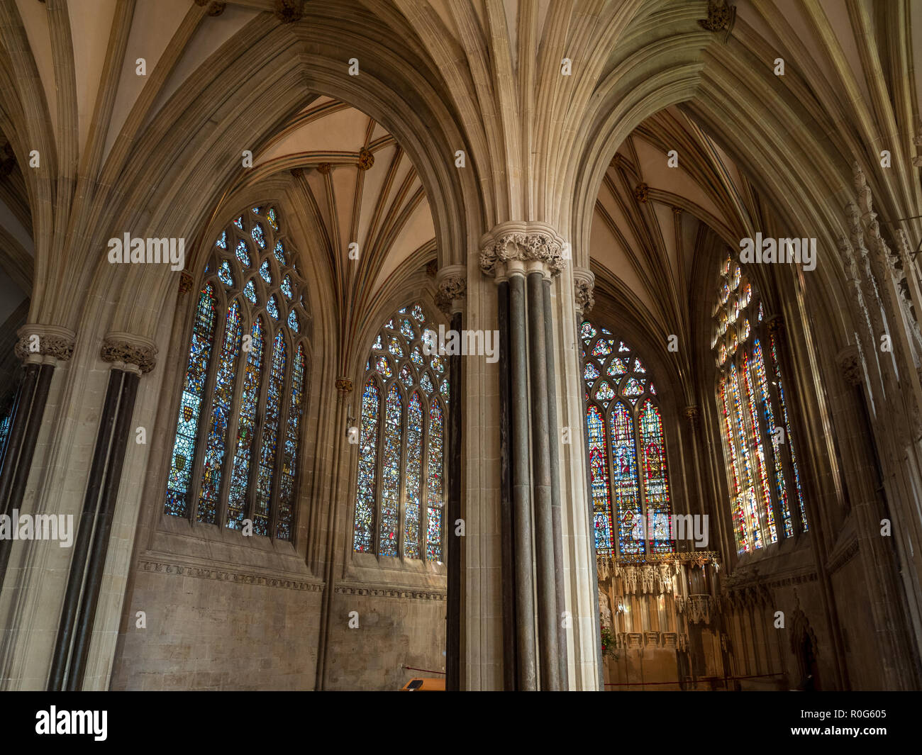 Wells Cathedral interior with impressive vaulted ceiling and stained ...