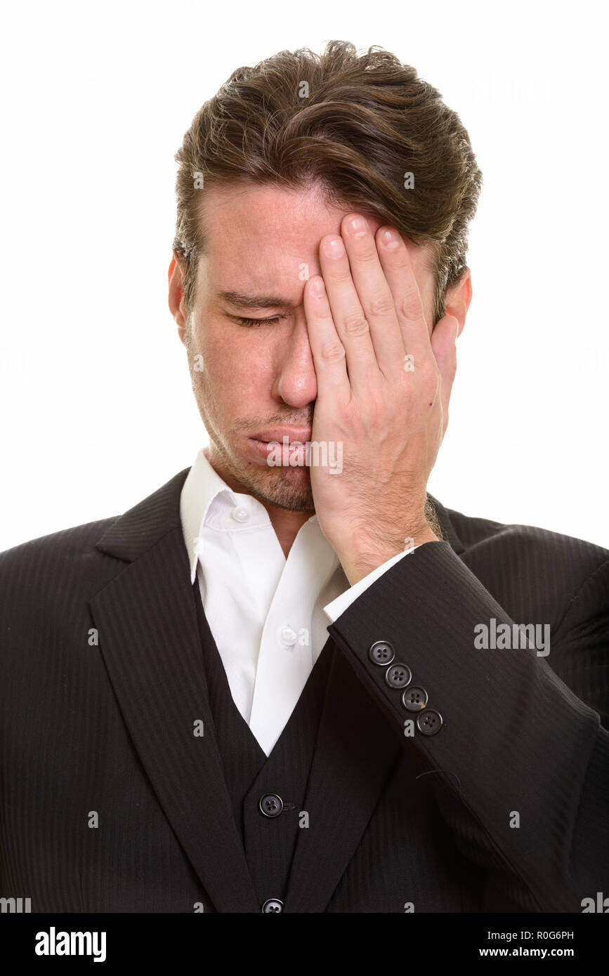 Face of Caucasian businessman looking upset and stressed Stock Photo ...