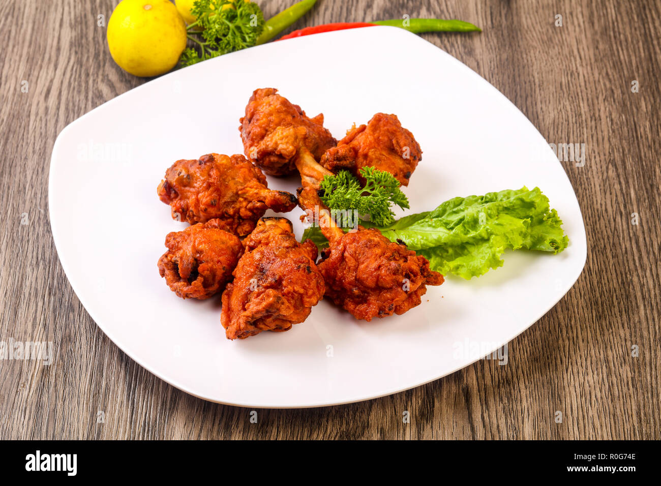 Indian traditional cuisine - Chicken lollipops with spices Stock Photo ...