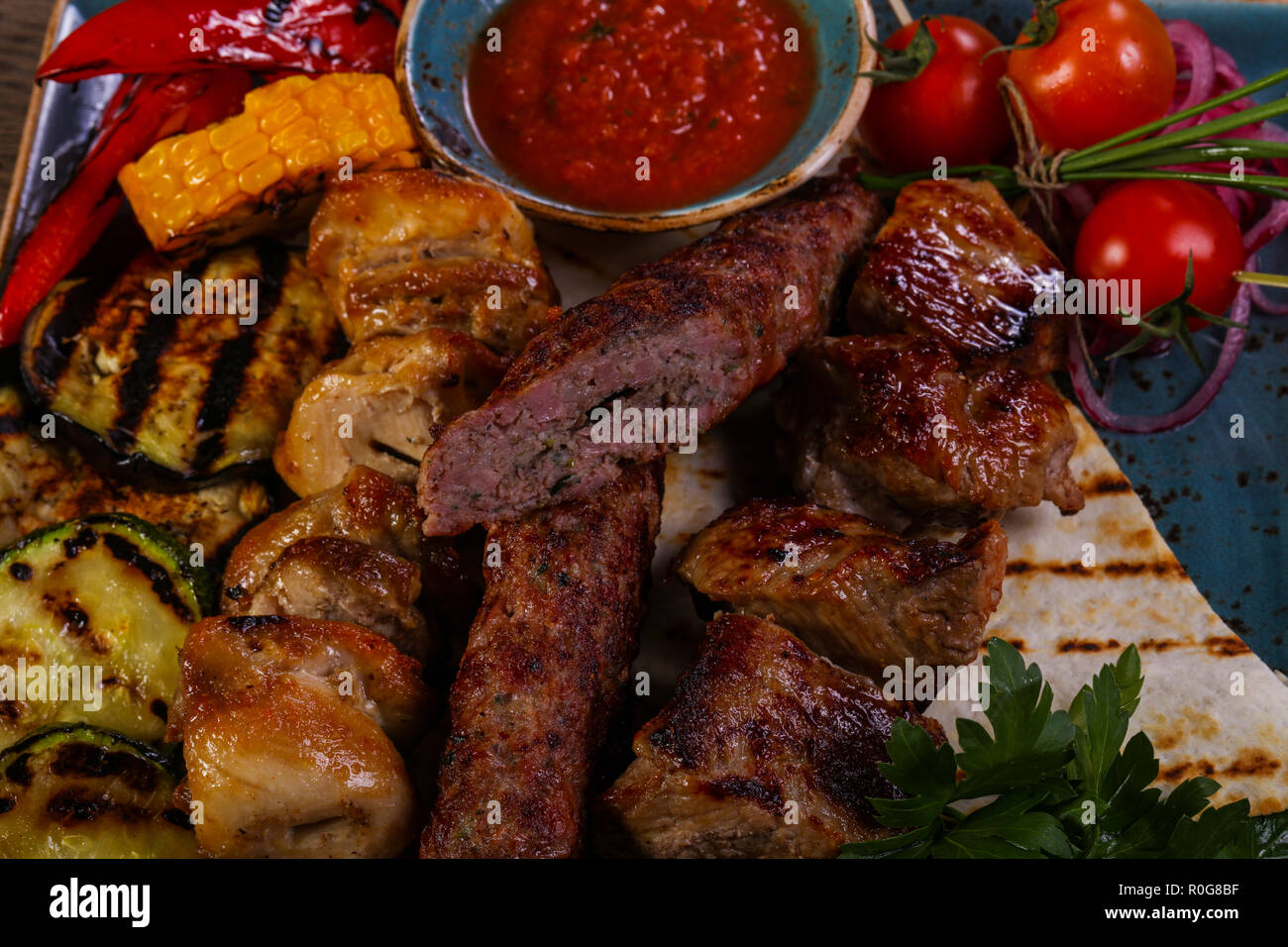 Grilled plate mix assortment meat Stock Photo - Alamy