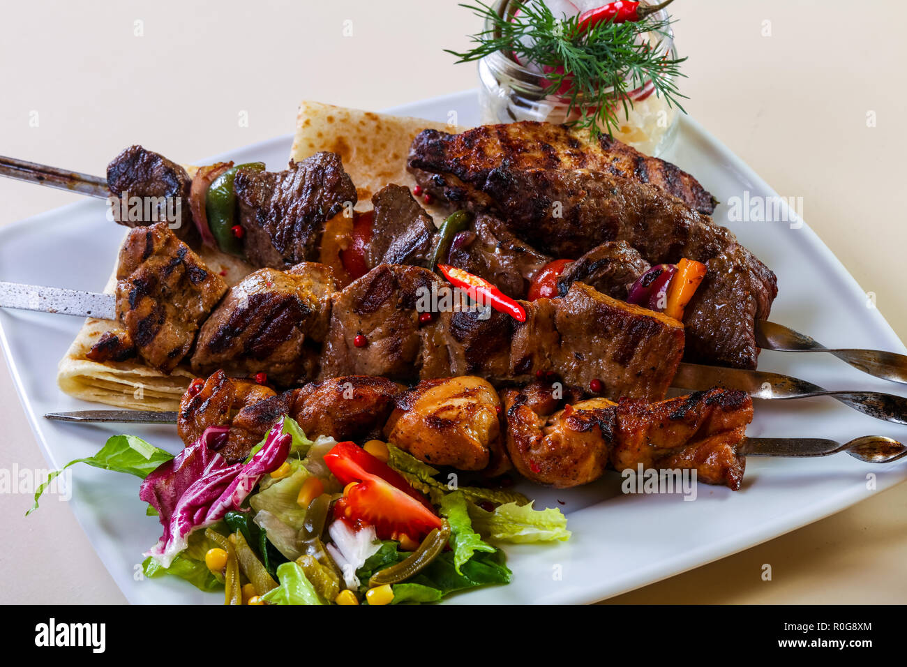 Barbeque meat mix plate with vegetalbes Stock Photo - Alamy