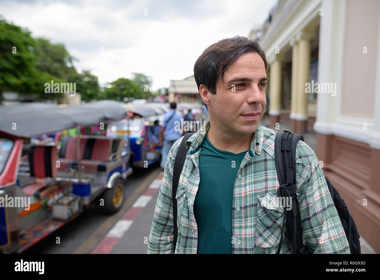 Handsome Persian tourist man exploring the city of Bangkok, Thai Stock ...