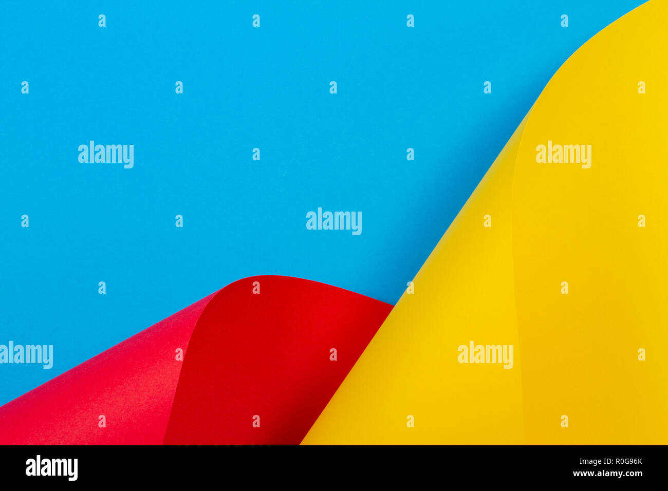 Abstract colorful background. Yellow red blue color paper in geometric ...