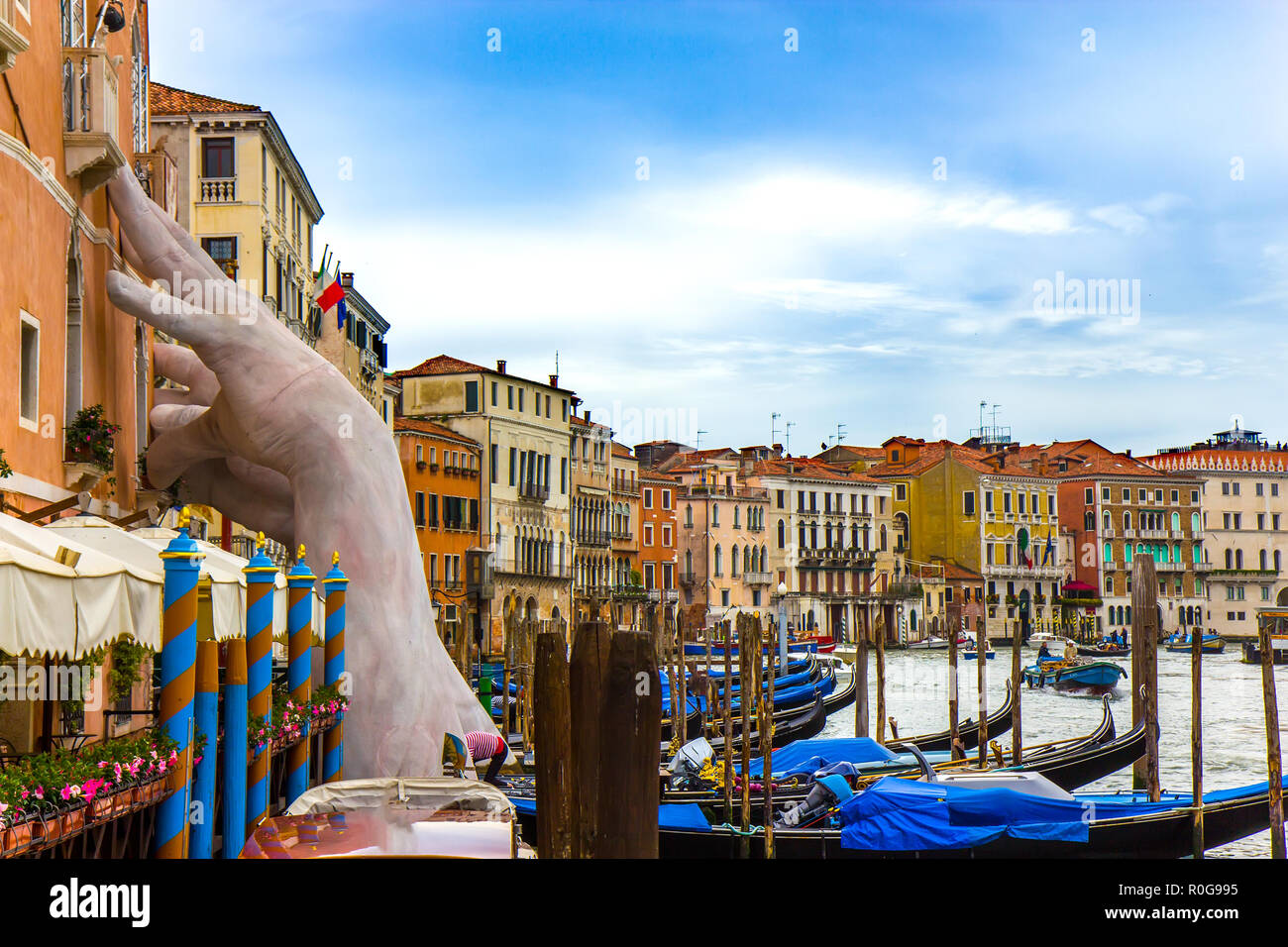 Hand statue in the Venice canal Stock Photo - Alamy