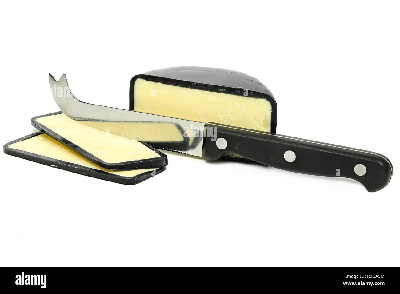 mature cheddar cheese with knife isolated on white background Stock ...