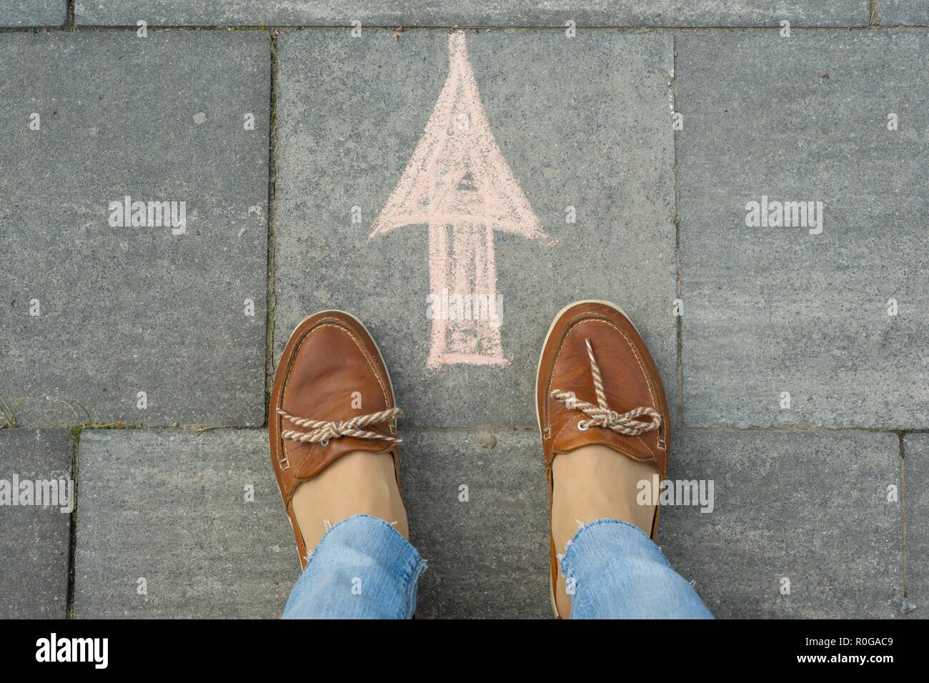 Feet Road Arrow Stock Photos & Feet Road Arrow Stock Images - Alamy