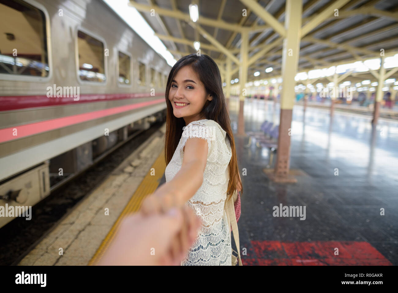 Couple holding hand rear view in love hi-res stock photography and ...