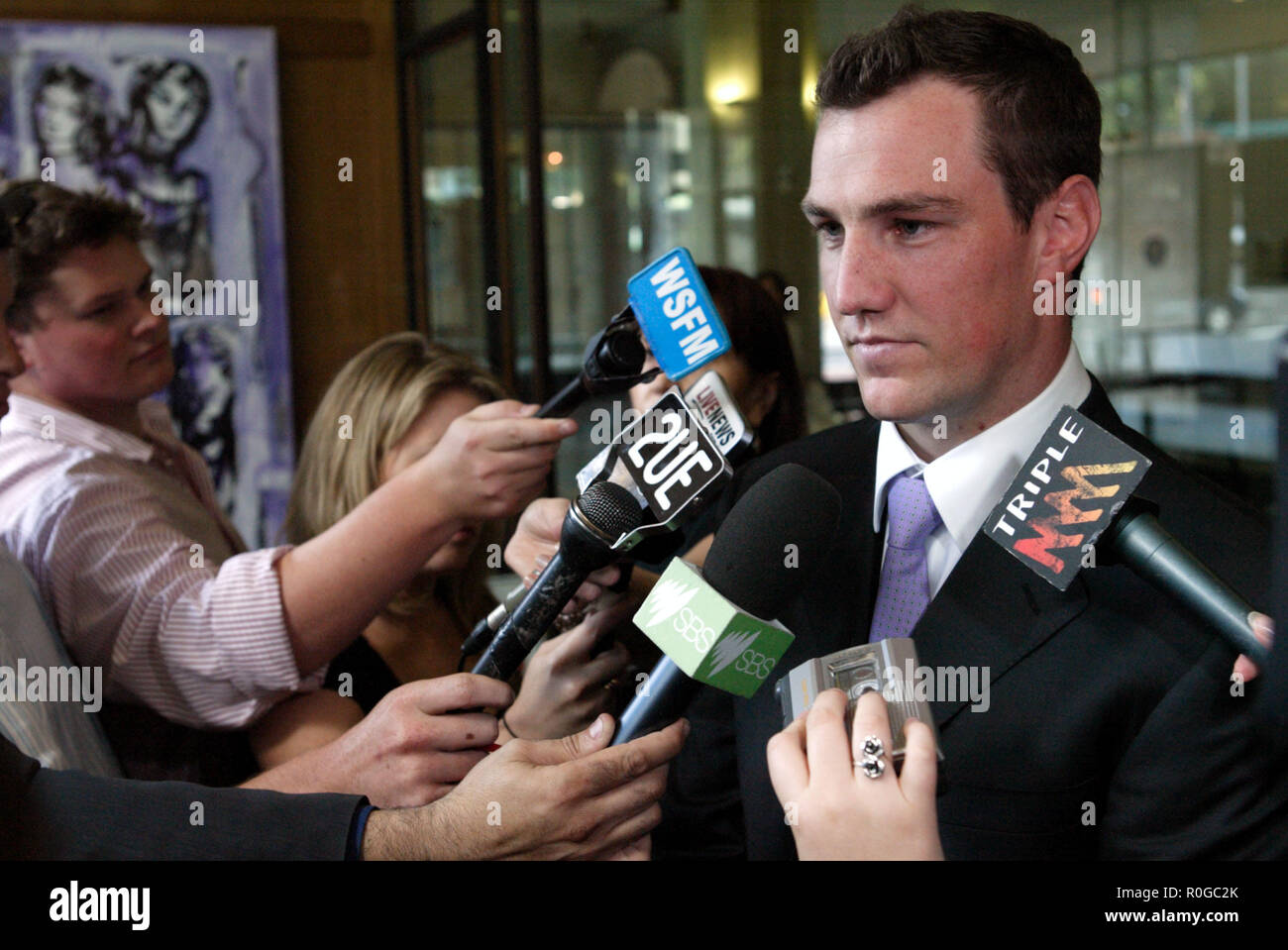 Simon Cowley leaves Downing Centre Court after the court case in which ...