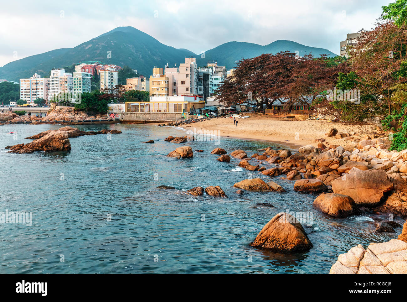 Rocky sea shore and small sandy beach of Stanley Bay in Hong Kong ...