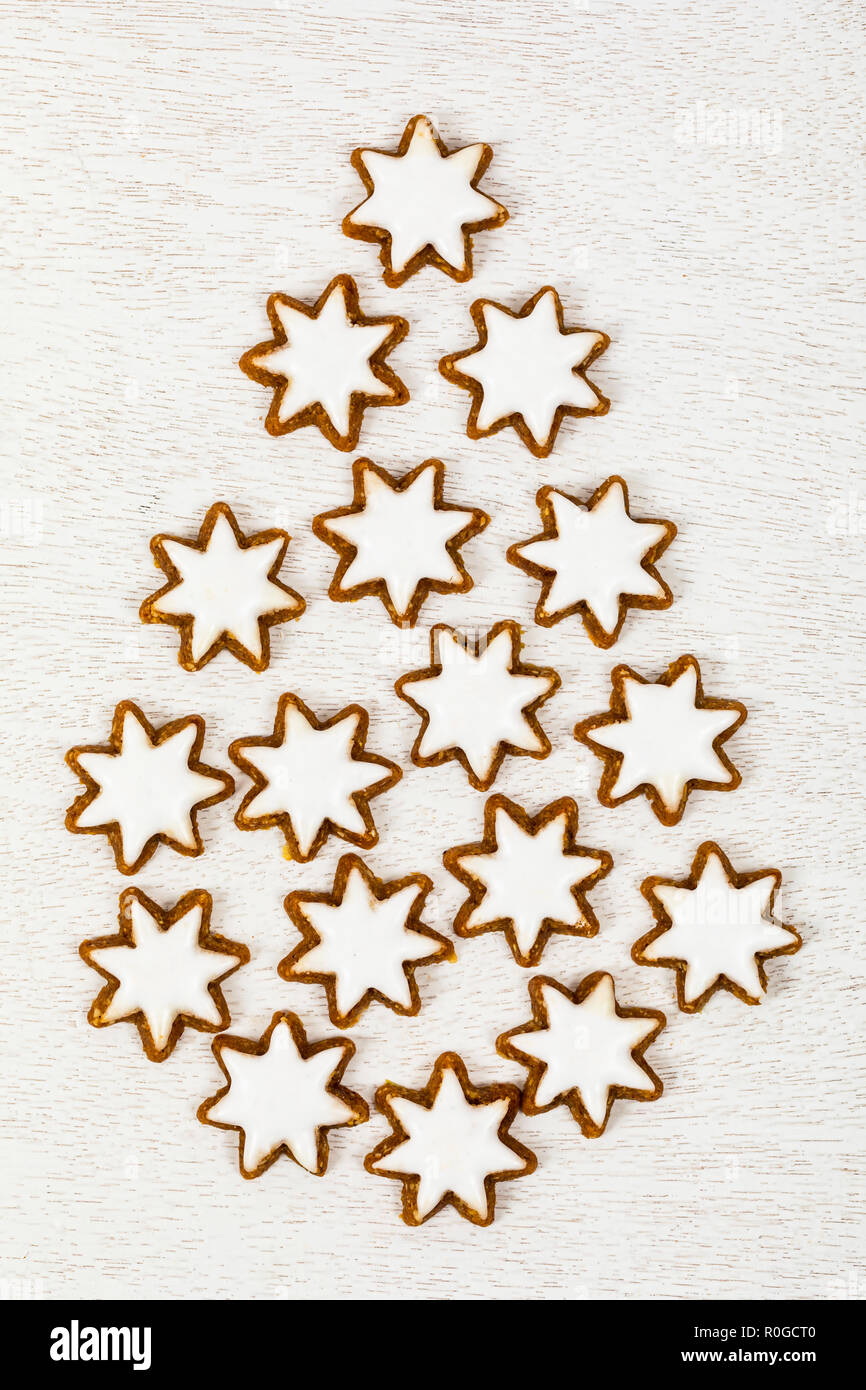 Christmas Tree made of Star Gingerbread Cookies as background on White ...
