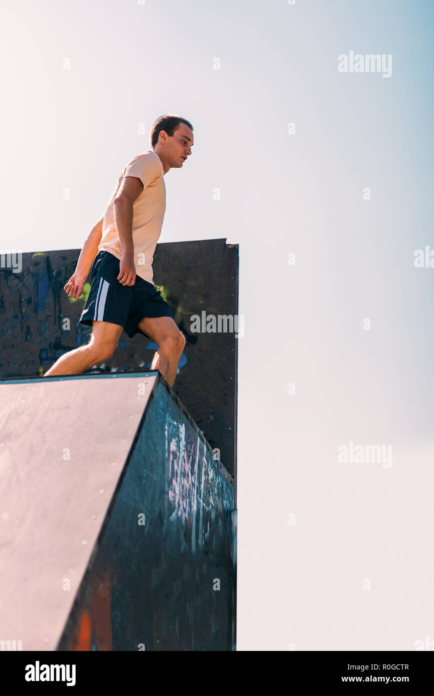 Free runner prepare to jumping on the wall Stock Photo - Alamy