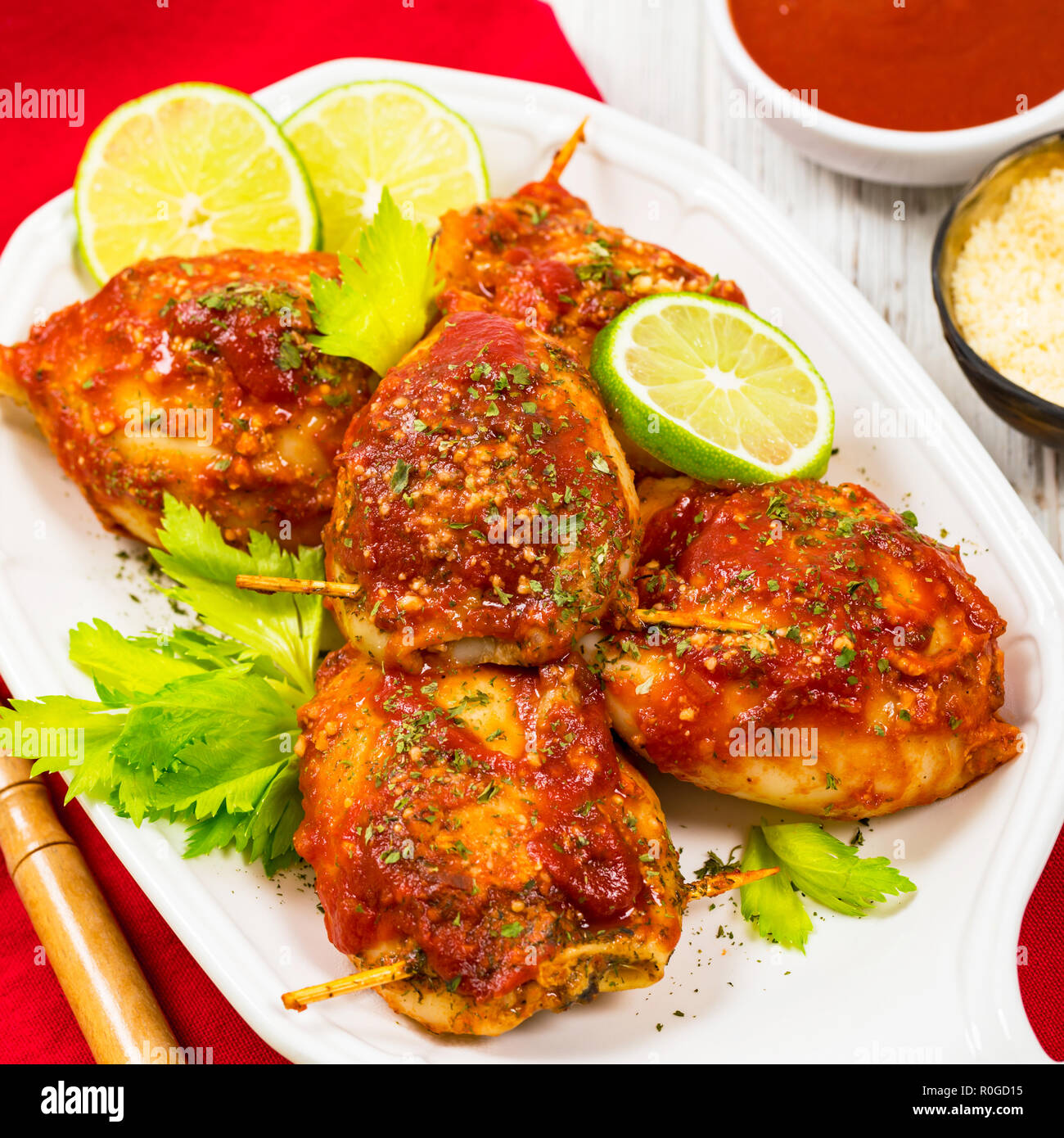 Calamari. Stuffed Squid Tubes with Tomato Sauce Stock Photo - Alamy