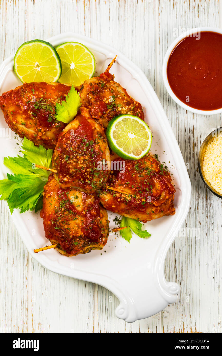 Calamari. Stuffed Squid Tubes with Tomato Sauce Stock Photo - Alamy