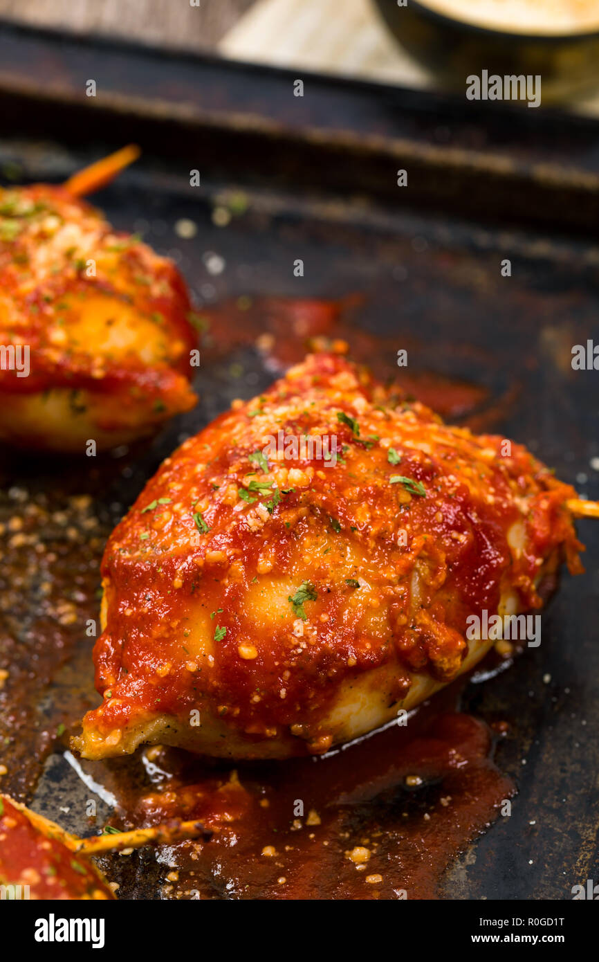 Calamari. Stuffed Squid Tubes with Tomato Sauce Stock Photo - Alamy