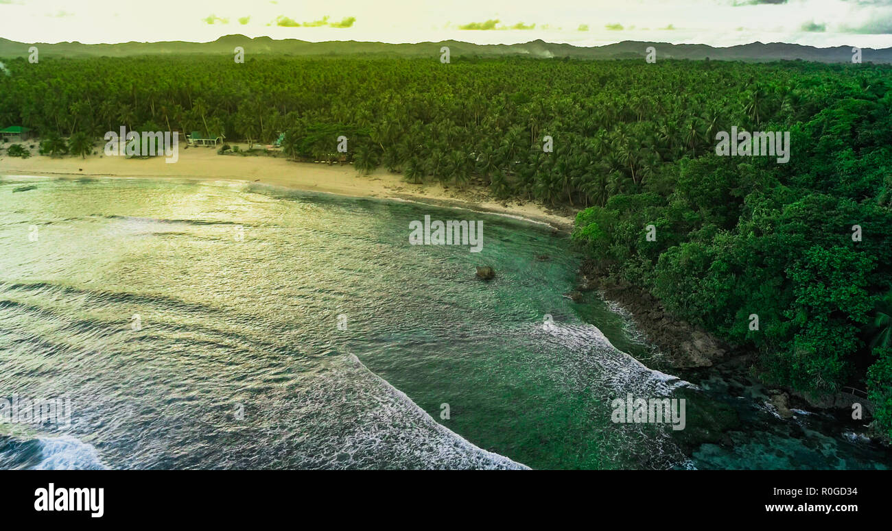 Aerial View sunset of Siargao Island and Tropical Pacific. View from ...