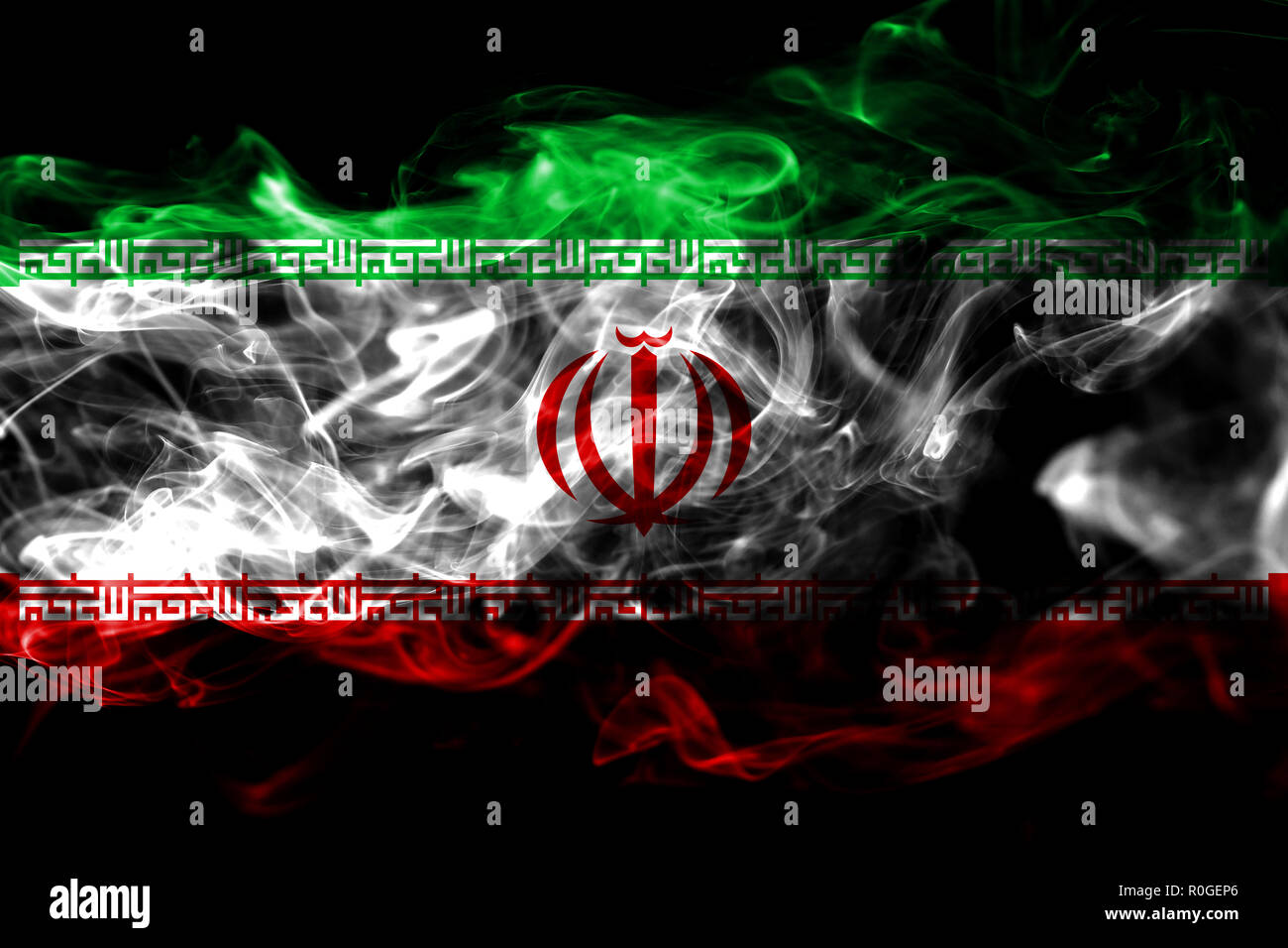 National flag of Iran made from colored smoke isolated on black ...