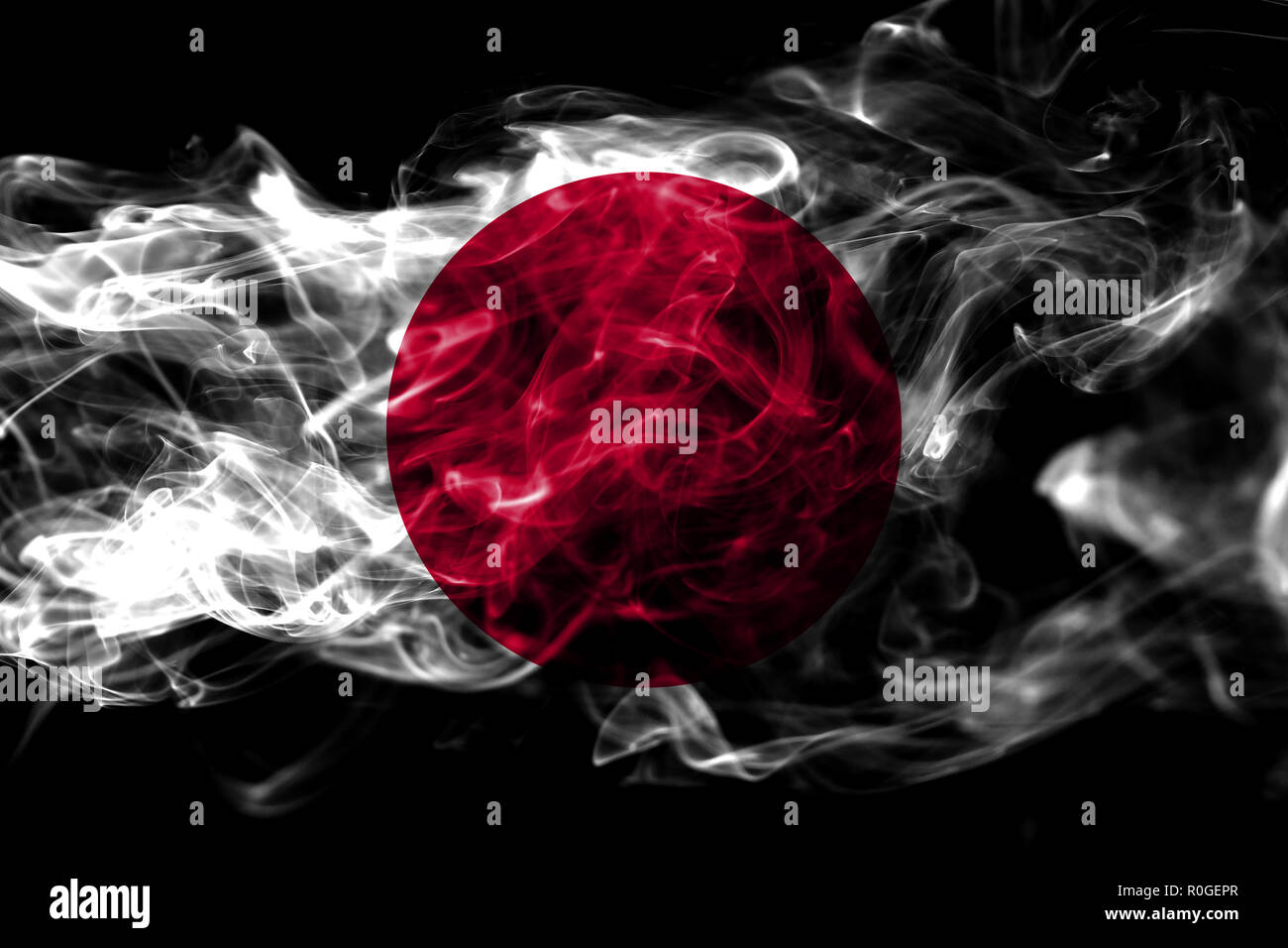 National flag of Japan made from colored smoke isolated on black ...
