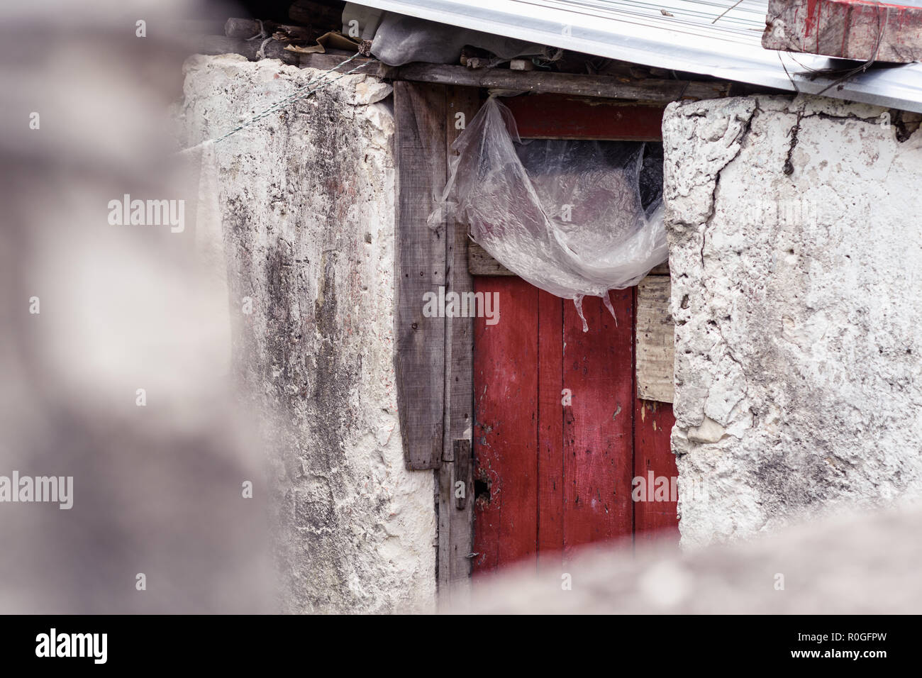 Grunge worn dirty house entrance of very pool people Stock Photo - Alamy