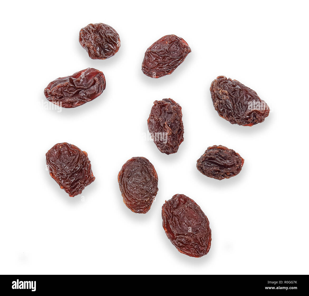 Raisins isolated on white with clipping path Stock Photo - Alamy