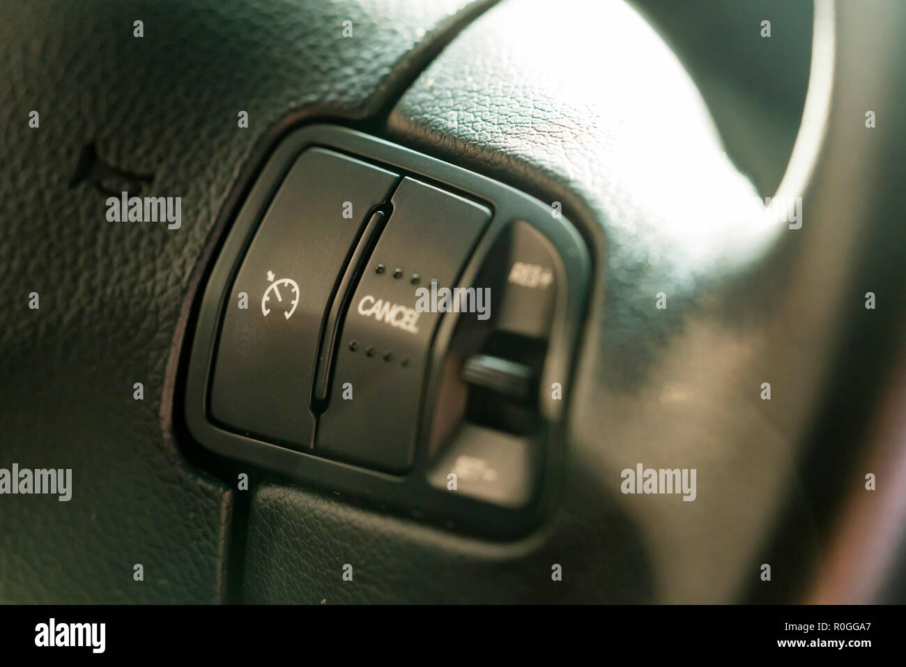 Cruise control unit in the new car close Stock Photo - Alamy